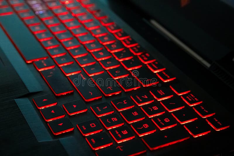 Red Backlight on a Modern Keyboard of Gaming Laptop in the Dark Stock ...