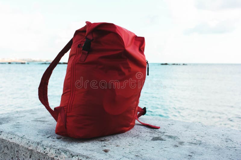 Red Backpack on the Beach, Sea, Ocean Stock Image - Image of holiday ...