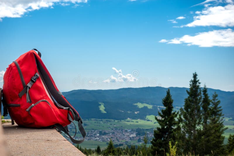 Red Hiking Backpack on Ledge on Mountain with Valley View on Summer ...