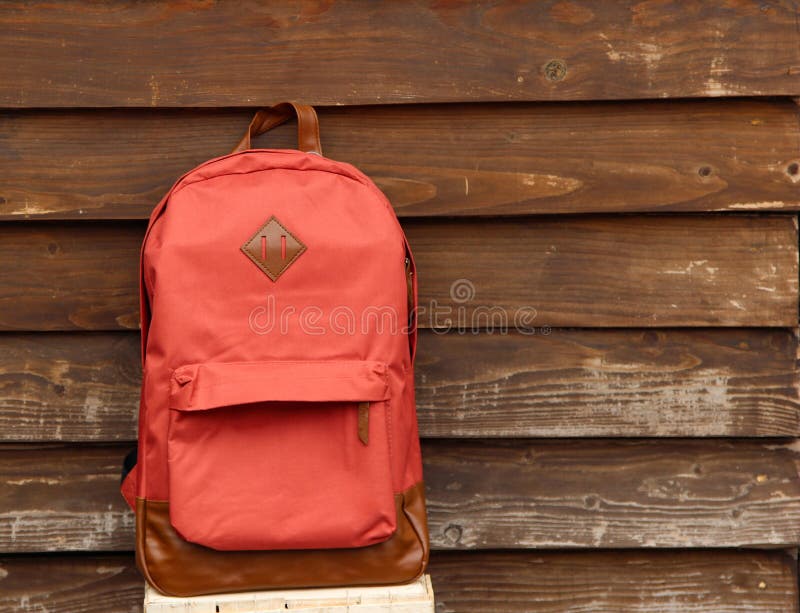 Red Backpack on a Wooden Background Stock Image - Image of shoulders ...