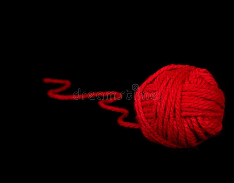 Red ball of yarn on black stock photo. Image of hobby - 49718728