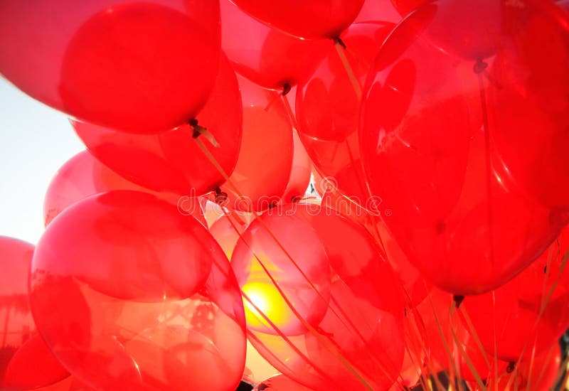 Red Balloons Flying in the Sky Stock Photo - Image of sunny, holiday ...