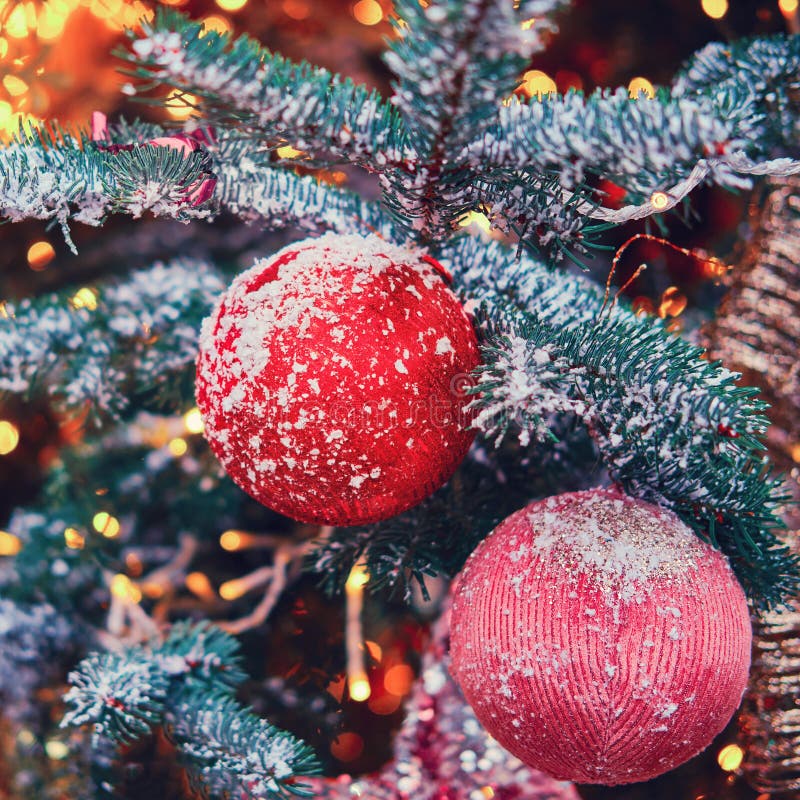 Red Balls Covered with Snow As a Toy for Decoration on the Christmas ...