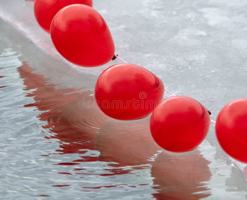 Red Balls Float on the Water Stock Photo - Image of beach, plastic ...