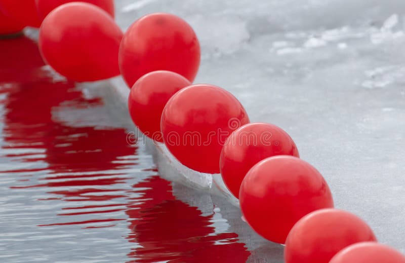 Red Balls Float on the Water Stock Photo - Image of warm, background ...