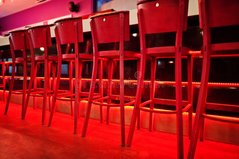 Red Bar Stools at Diode Color Light. Stock Photo - Image of terrace ...