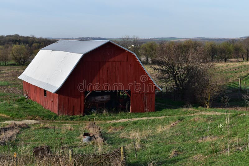 Red Barn in a Field on a Sunny Spring Morning Stock Photo - Image of ...