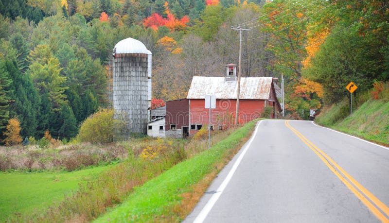 Red barn by country road stock photo. Image of fall, forrest - 79575502