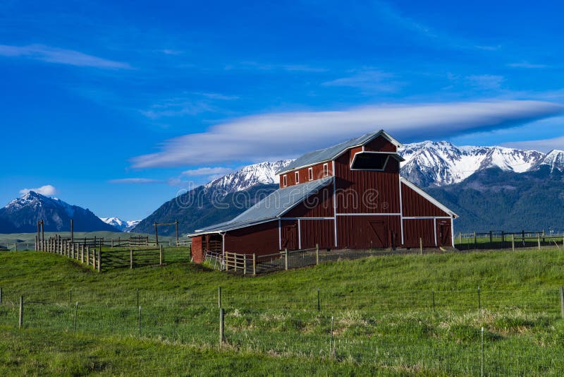 Red Barn Near Mountains in Eastern Oregon Stock Photo - Image of joseph ...