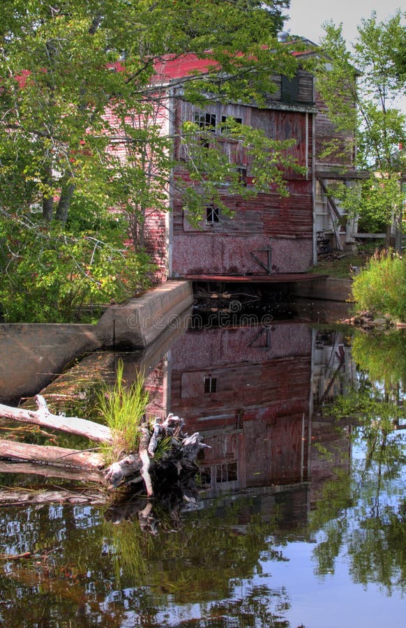 Red barn and water dam stock photo. Image of power, mill - 95803872