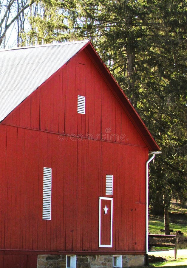Red barn in woods stock photo. Image of americana, star - 308857142