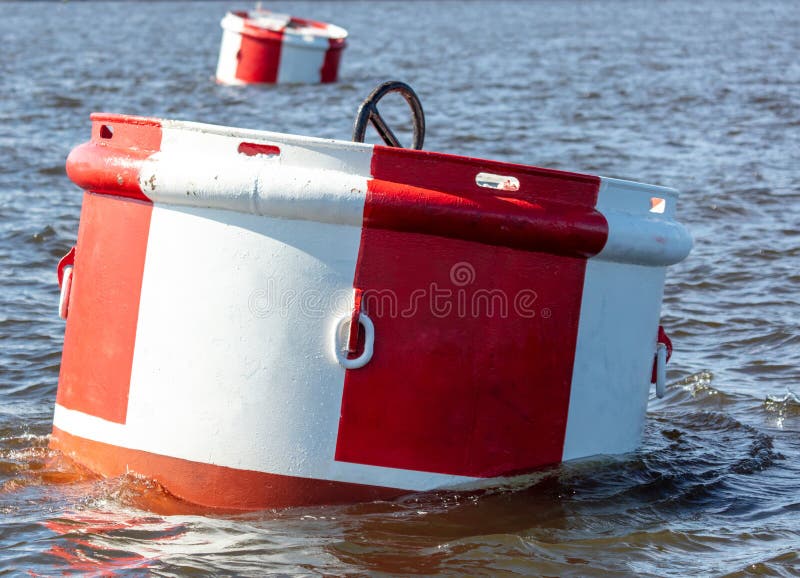 A Red Barrel Floats in the Water Stock Photo - Image of riding ...