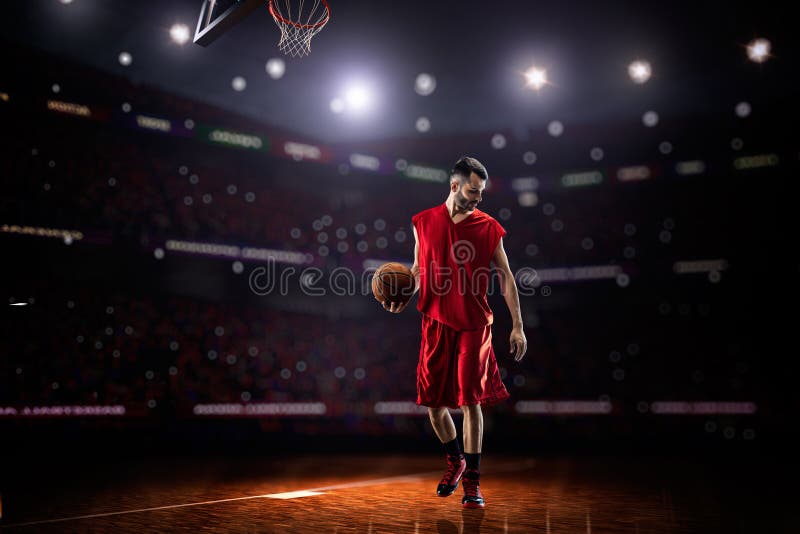 Red Basketball Player in Action Stock Photo - Image of players, moving ...