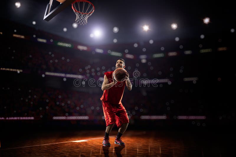 Red Basketball Player in Action Stock Photo - Image of playing, holding ...