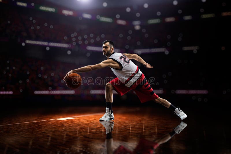 Red Basketball Player in Action Stock Photo - Image of people, athlete ...