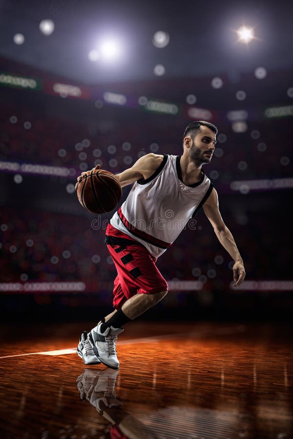 Red Basketball Player in Action Stock Photo - Image of jump, fitness ...