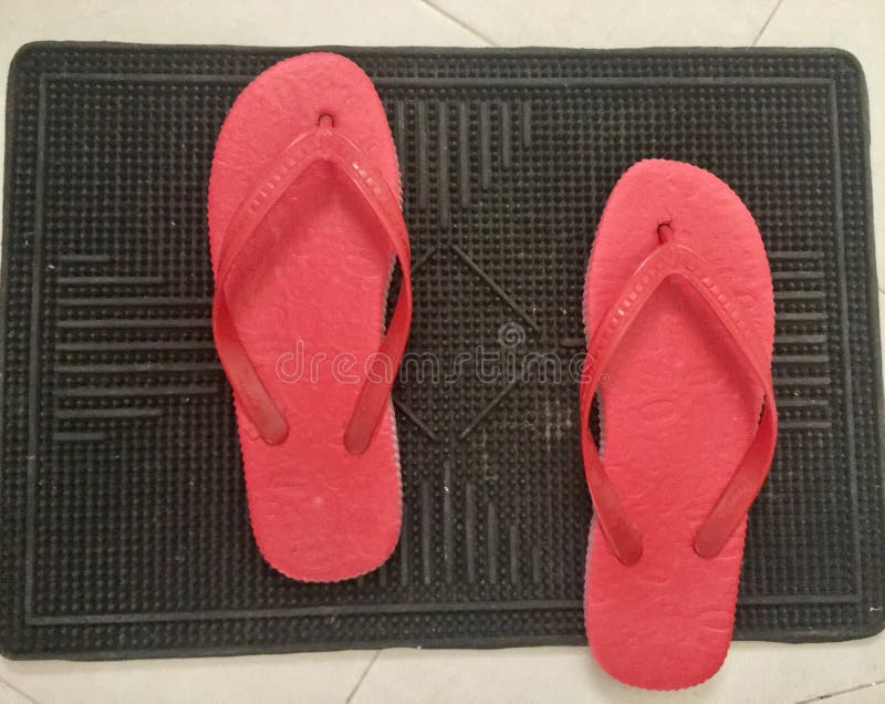 Red Bathroom Slipper on Black Rag Stock Photo - Image of tiles, textile ...