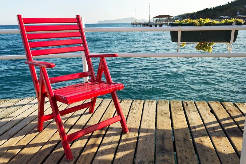 Red beach chair stock photo. Image of vacation, wood - 46424154