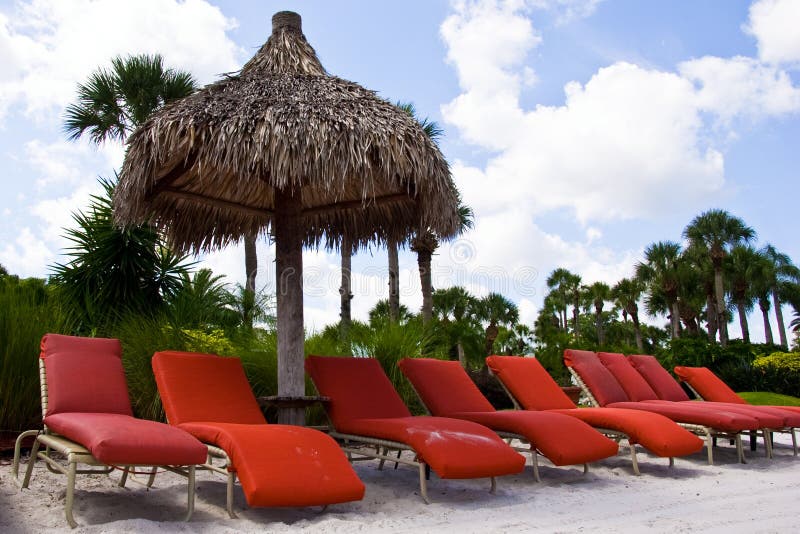 Red beach chairs stock photo. Image of shore, tropic - 27595540