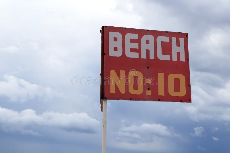 Red beach number sign stock image. Image of sign, number - 181510345