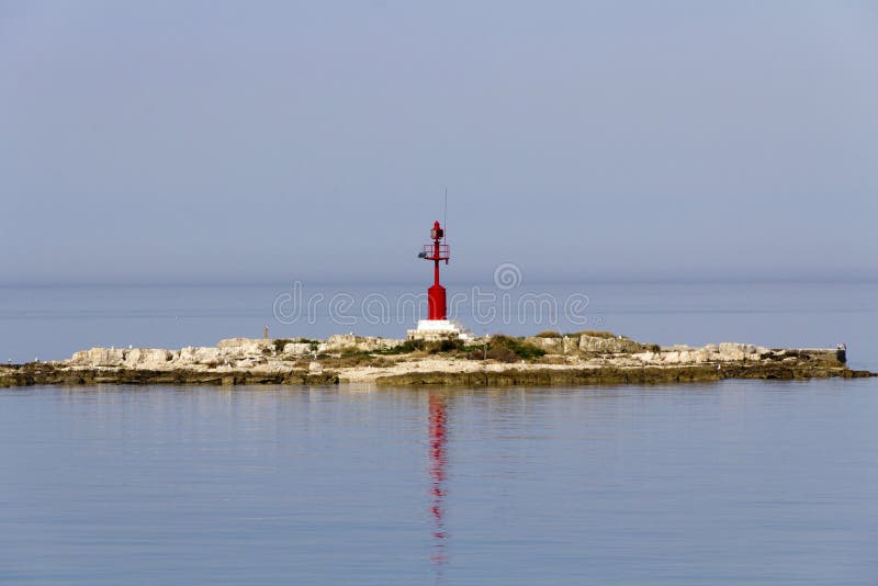 Red Beacon on Smallest Island Stock Image - Image of reef, blue: 24025005