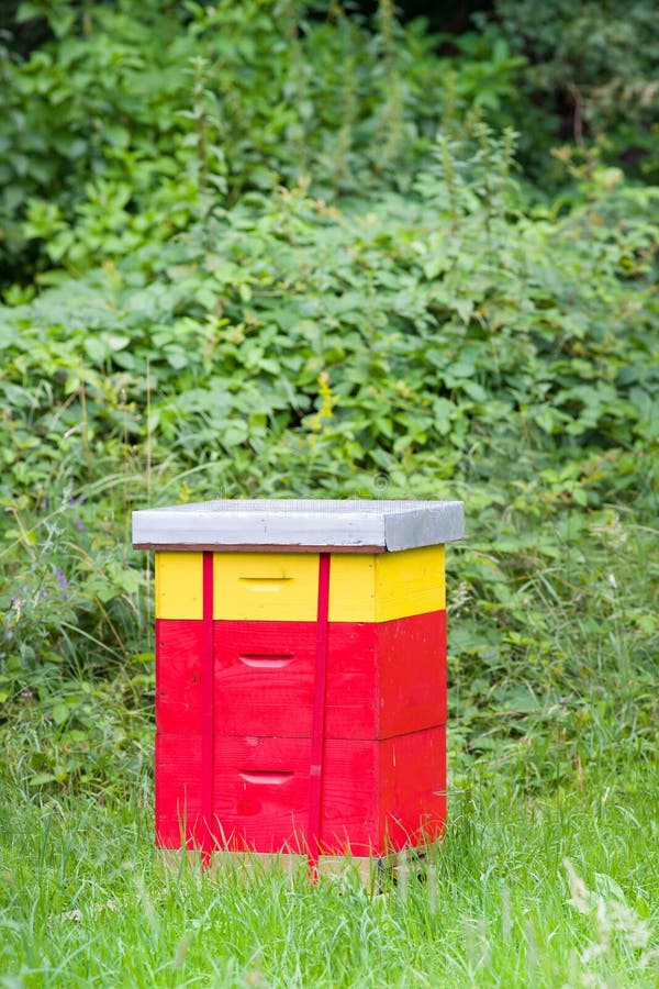 Red beehive. stock image. Image of rural, outdoor, blue - 65653103