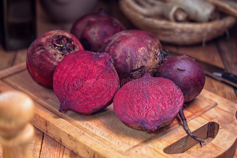Red Beetroot - Beetroots on a Cutting Board and One Cut in Half, on the ...