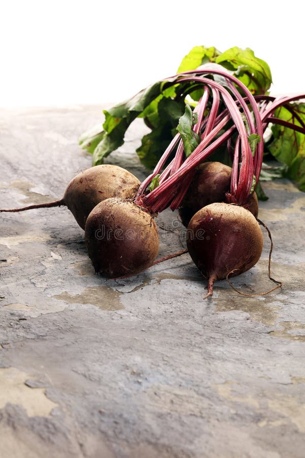 Red Beetroot with Herbage Green Leaves on Rustic Background. Org Stock ...