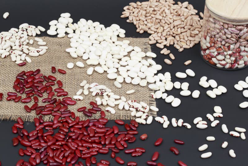 Multicolored Beans are Scattered on a Gray Background. Stock Photo ...