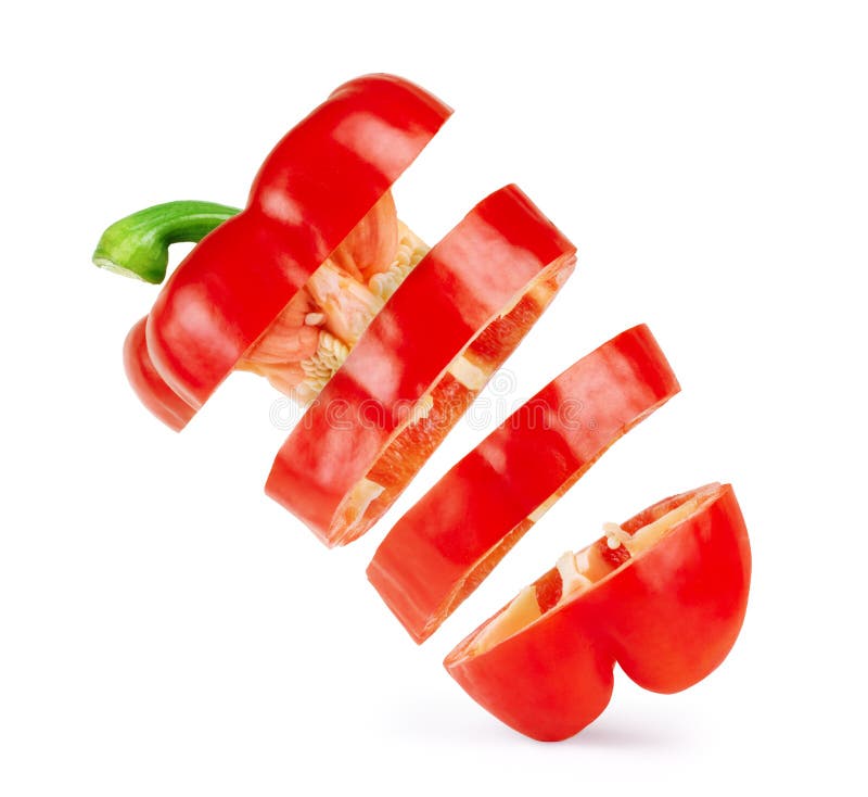 Red Bell Pepper Sliced into Pieces in the Air on an Isolated White ...
