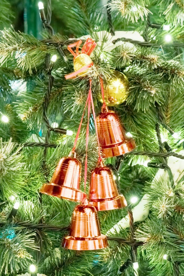Red bells on green spruce stock image. Image of ornaments - 306694509