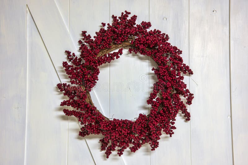 Red Berry Grapevine Wreath on Barn Door Stock Photo - Image of design ...