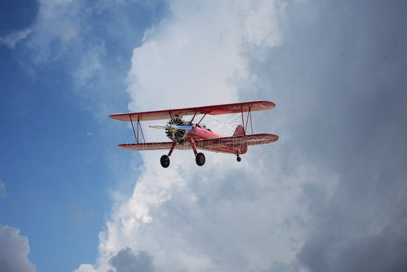 Red Bi-Plane Dramatic Sky editorial photography. Image of wheels - 40892452