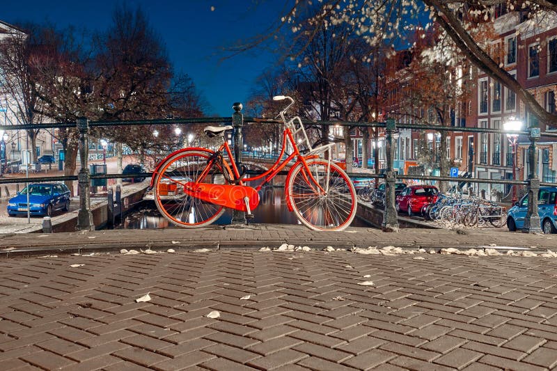 Red bicycle on a bridge stock image. Image of outdoor - 212143297