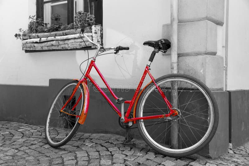 Red Bicycle on Cobblestone Street in the Old Town, Black and White ...
