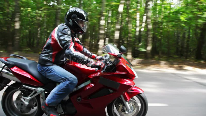 Red Bike Moves on Asphalt Road. Moving Stock Footage - Video of ...