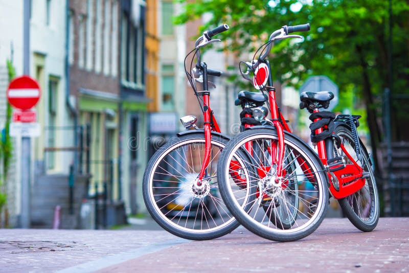 Red Bikes on Old Bridge in Amsterdam, Netherlands Stock Image - Image ...