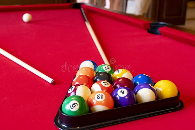 Red Billiard Table with Billiard Balls and Cues Stock Image - Image of ...