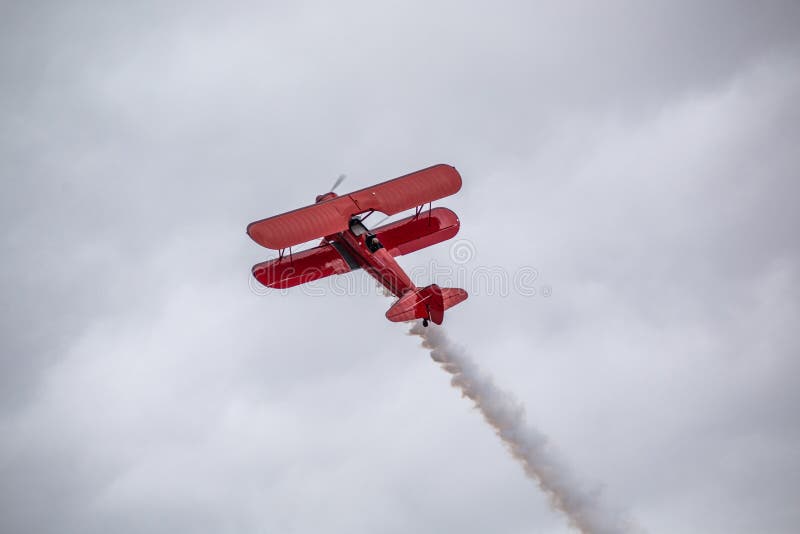 Red Biplane 1 stock photo. Image of aerobatics, biplane - 229367500