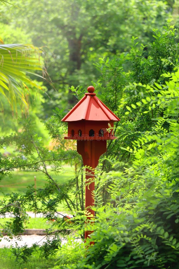Red Birdhouse stock photo. Image of birdhouse, outside - 248543110