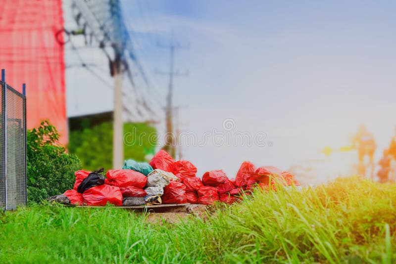 Garbage Bag Stacking a Lot with Green Grass. Stock Image - Image of ...