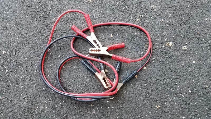 Red and Black Jumper Cables on Ground Stock Image - Image of metallic ...