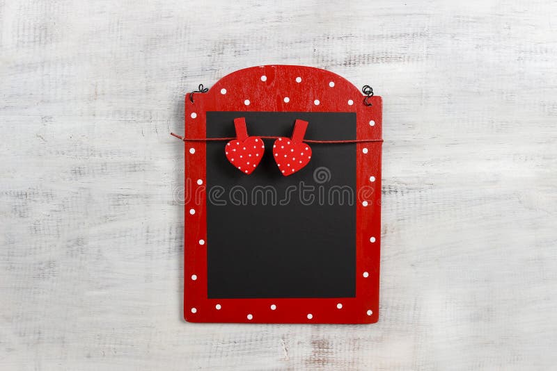 Red and Black Memo Board with Clothes Pegs in Heart Shape Stock Image ...