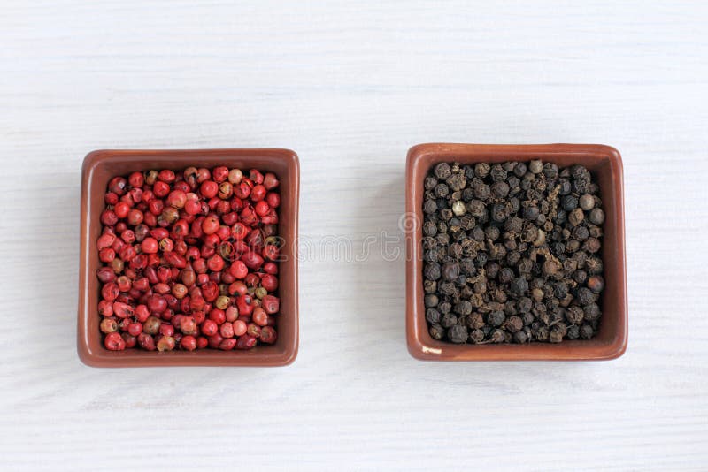 Two colors condiments stock image. Image of peppercorns - 138968481