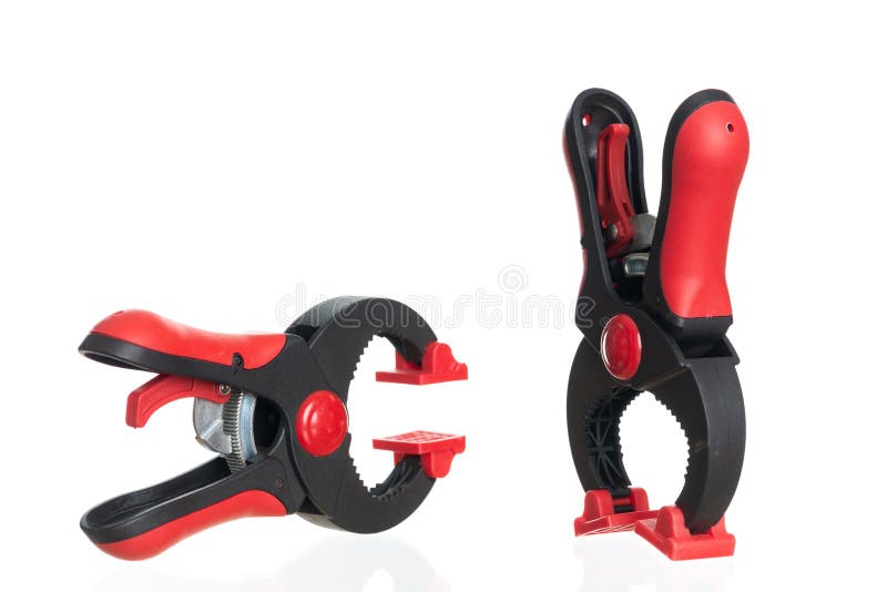 Red and Black Plastic Clamp Isolated on White Stock Image - Image of ...