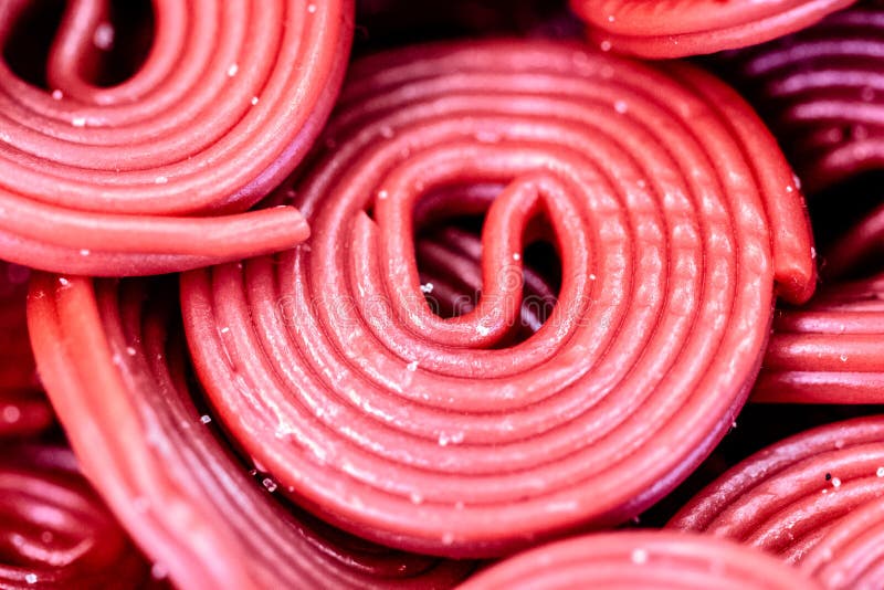 Red and black rolled gummy stock image. Image of extract - 187596999