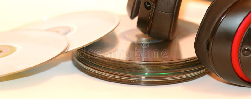 Stereo Headphones and Compact Music Disc Stock Image - Image of lyrics ...