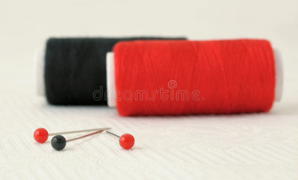 Red and black threads stock photo. Image of tailor, sewing - 31380108