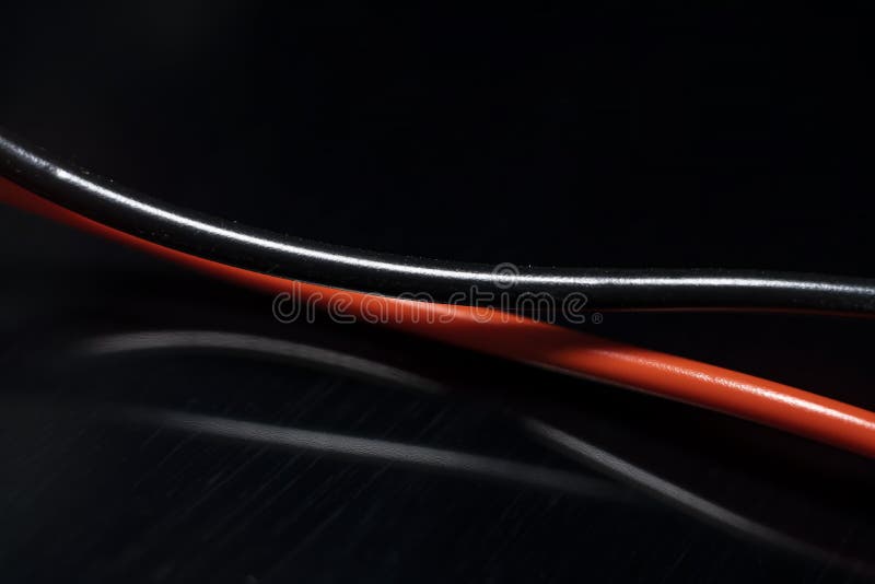 Red and Black Wire on a Black Background Stock Image - Image of ...
