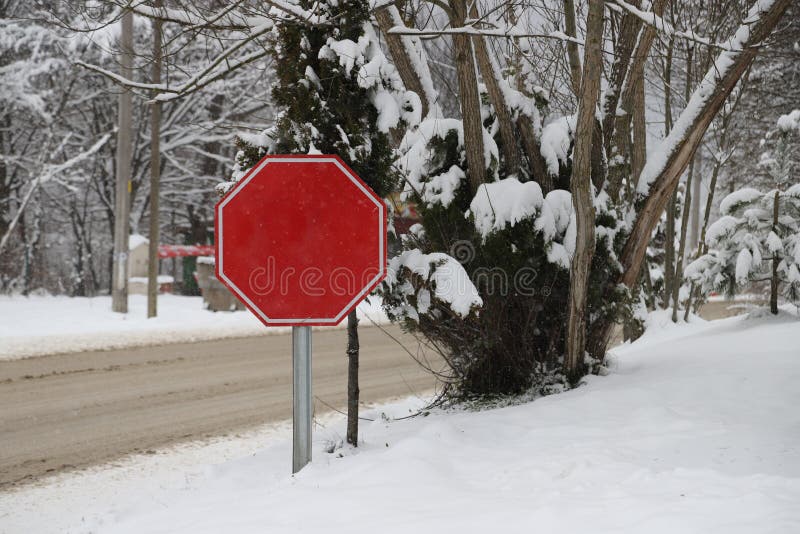 Red Blank Warning Sign in a Snowy Environment. Stock Image - Image of ...